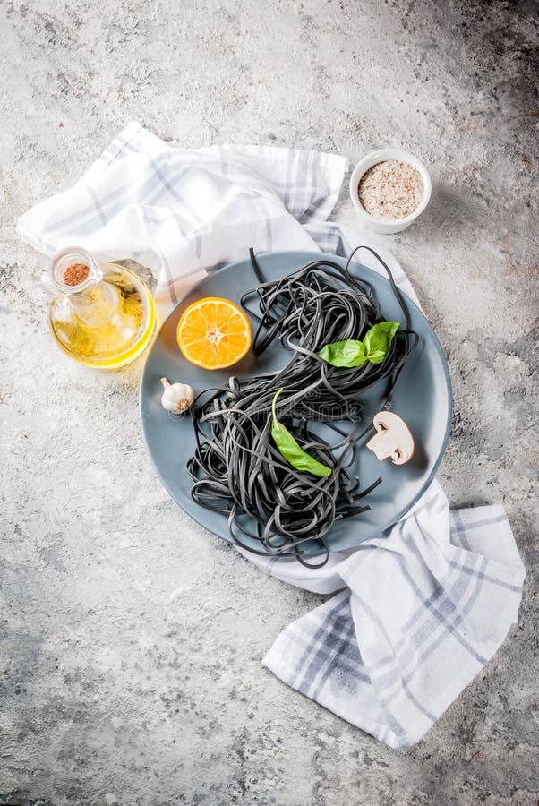 Raw Black Cuttlefish Ink Spaghetti Pasta Stock Image - Image of squid ...