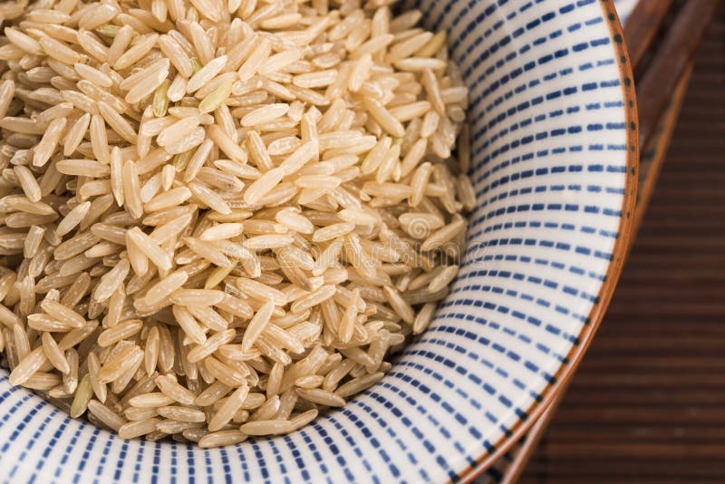 Raw brown rice stock photo. Image of eating, healthy - 67270300