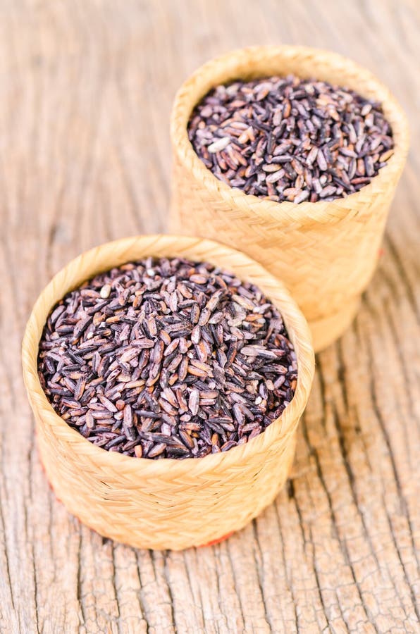 Raw Brown Sticky Rice on Bamboo Basket Stock Image - Image of cooked ...