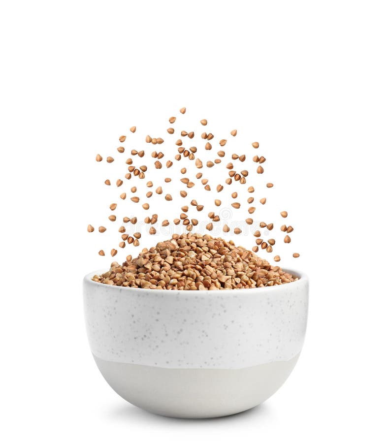 Raw Buckwheat Grains Falling in Bowl on White Background Stock Image ...