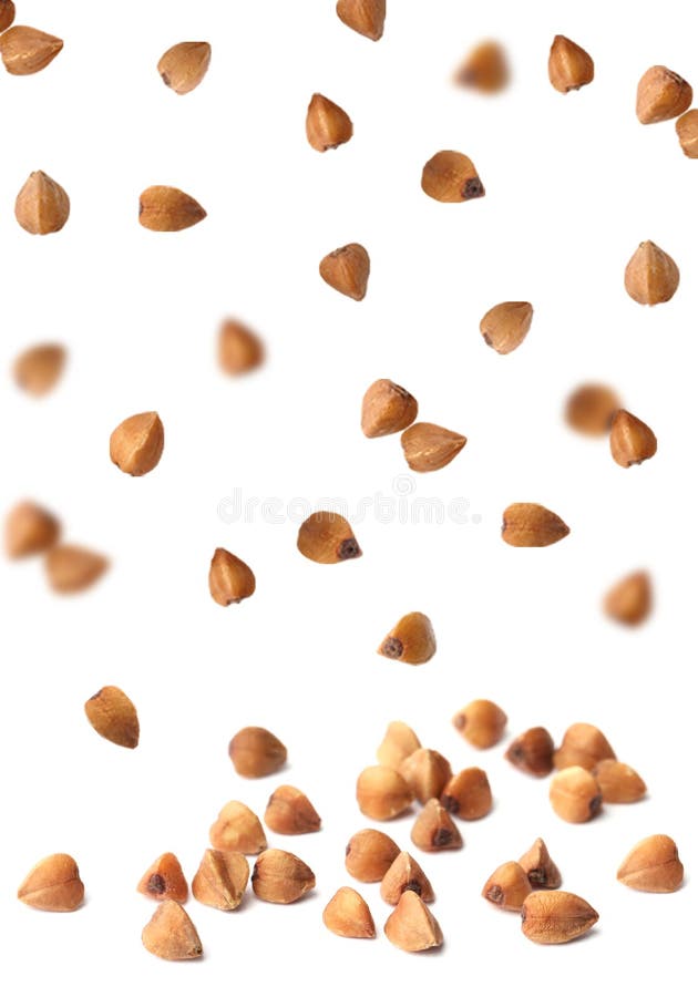 Raw Buckwheat Grains Falling on White Background Stock Photo - Image of ...