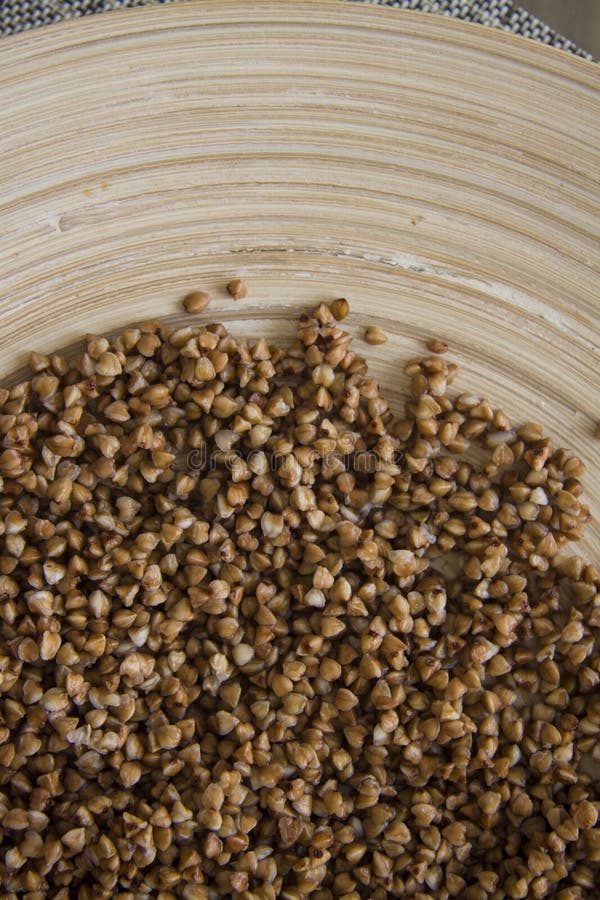 Raw buckwheat groats stock image. Image of sack, brown - 58765683