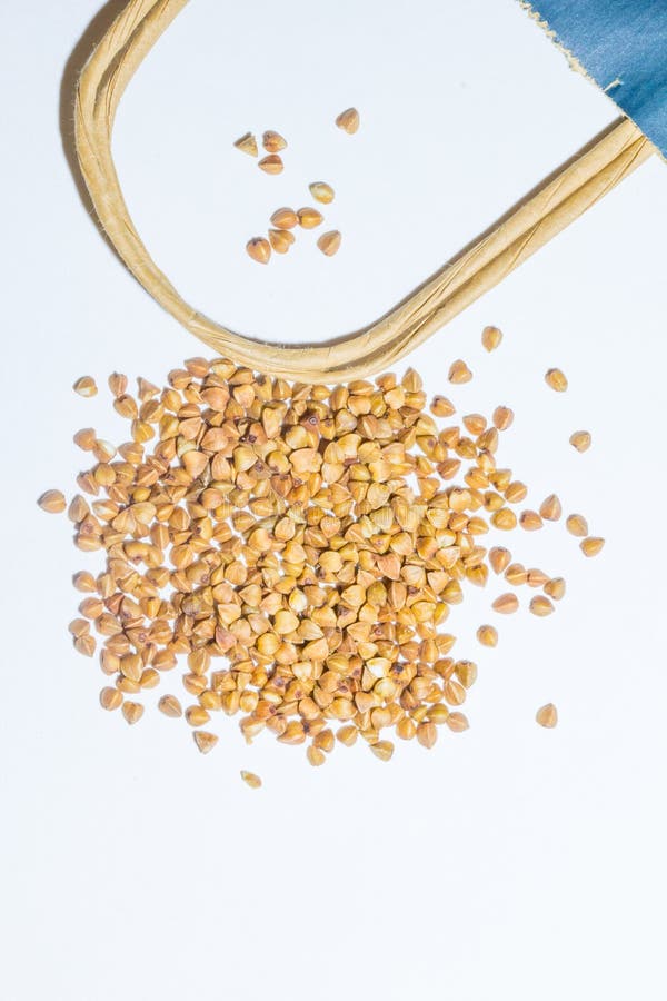 Raw Buckwheat on White Background. Buckwheat Grains.Raw Buckwheat on ...