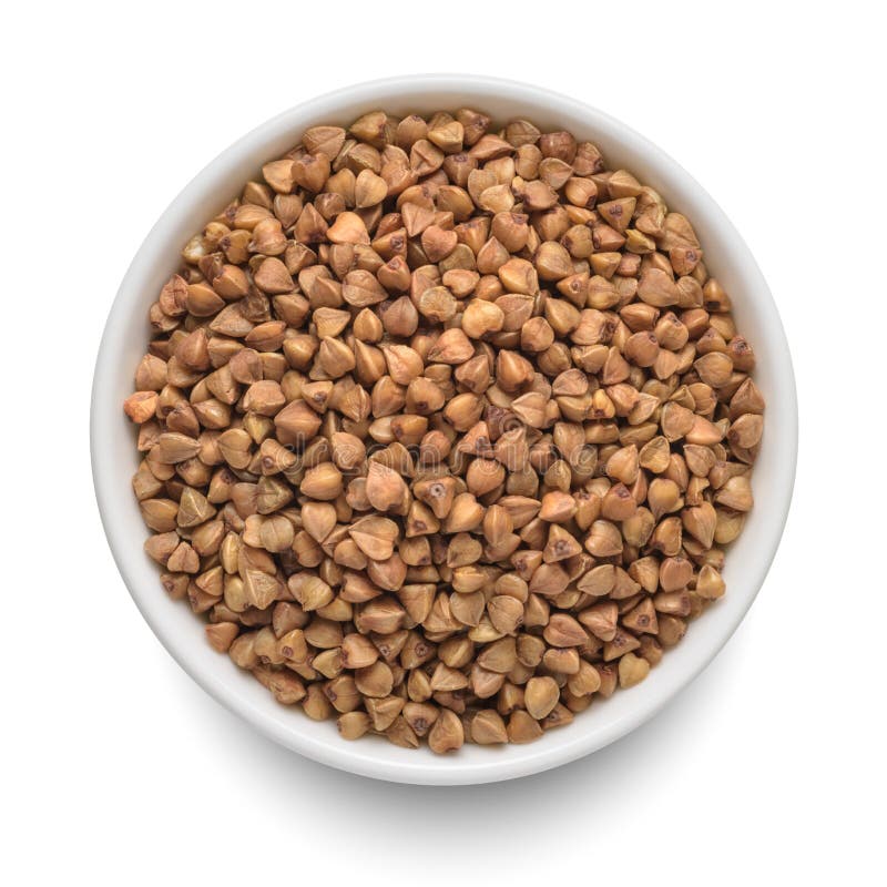 Raw Buckwheat in White Bowl Isolated on White. Top View Stock Photo ...