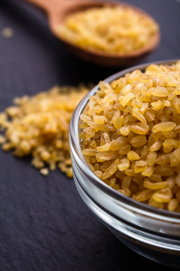Raw Bulgur on a Dark Stone Background Stock Image - Image of wheat ...