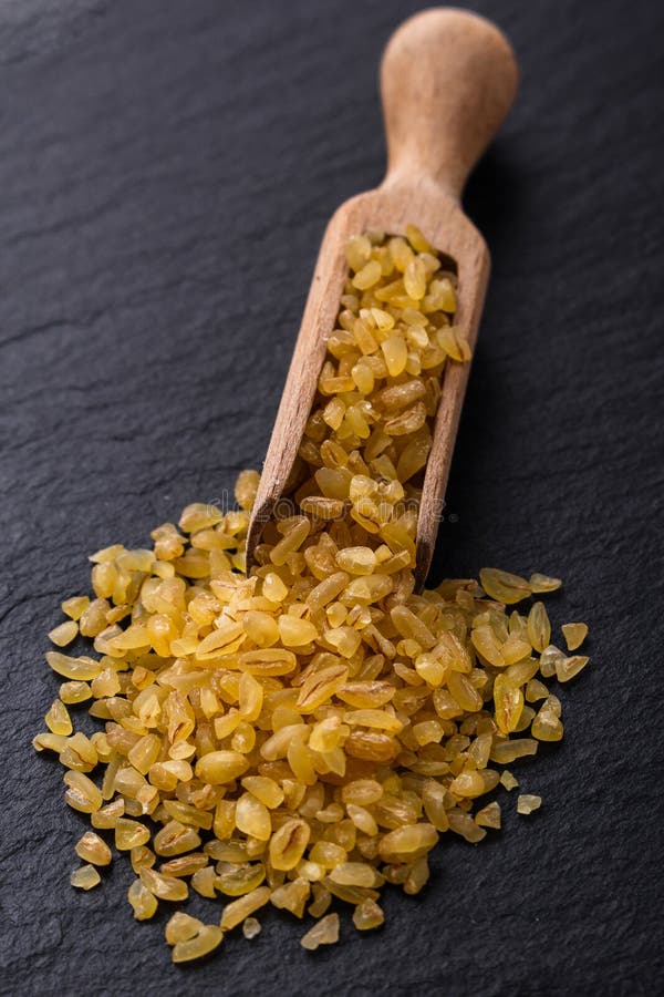Raw Bulgur on a Dark Stone Background Stock Photo - Image of seed, heap ...