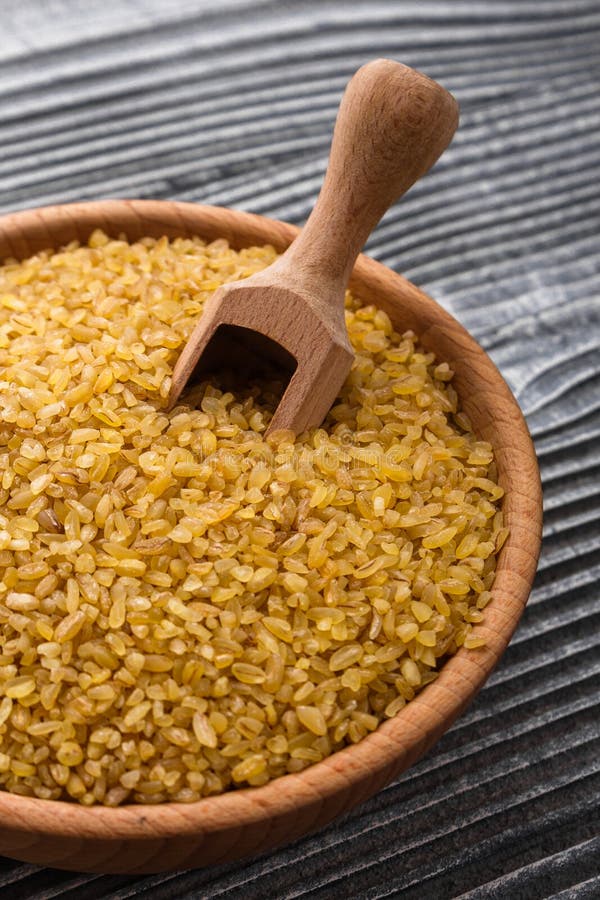 Raw Bulgur on a Rustic Wooden Background Stock Image - Image of healthy ...
