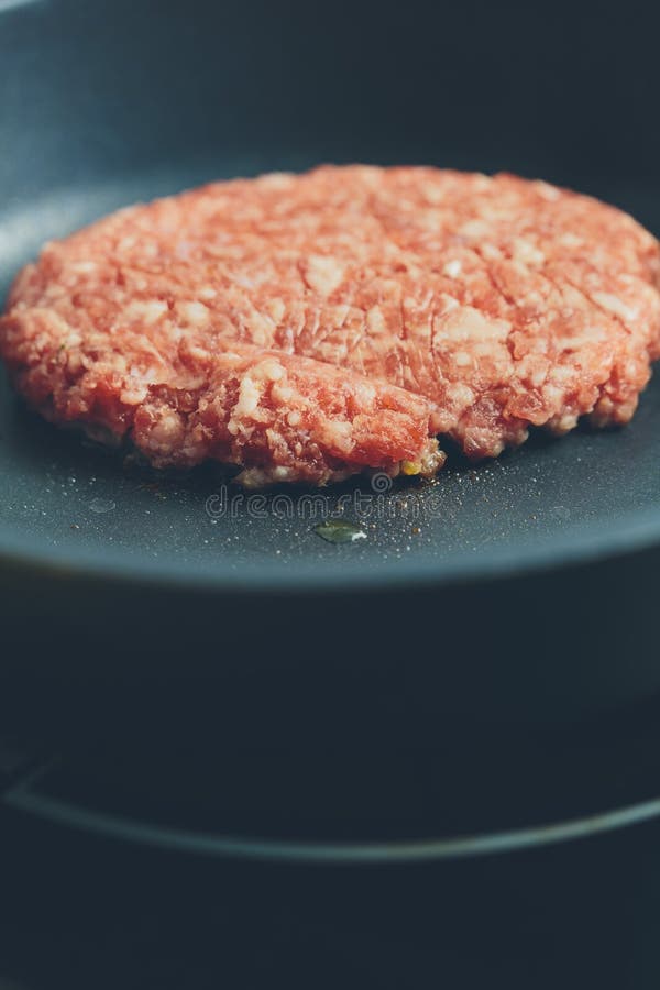 Beef Burger Texture Being Cooked on a Black Pan Close Up Stock Photo ...