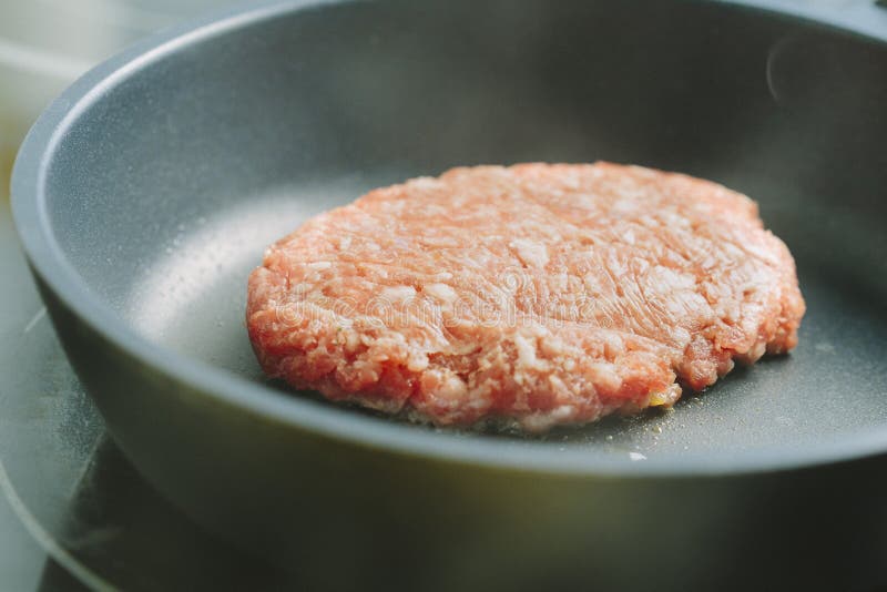 Beef Burger Texture Being Cooked on a Black Pan Close Up Stock Photo ...