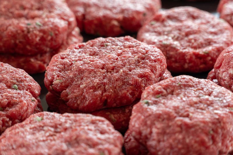 Raw Burgers from Organic Beef on Stock Photo - Image of cook, dinner ...