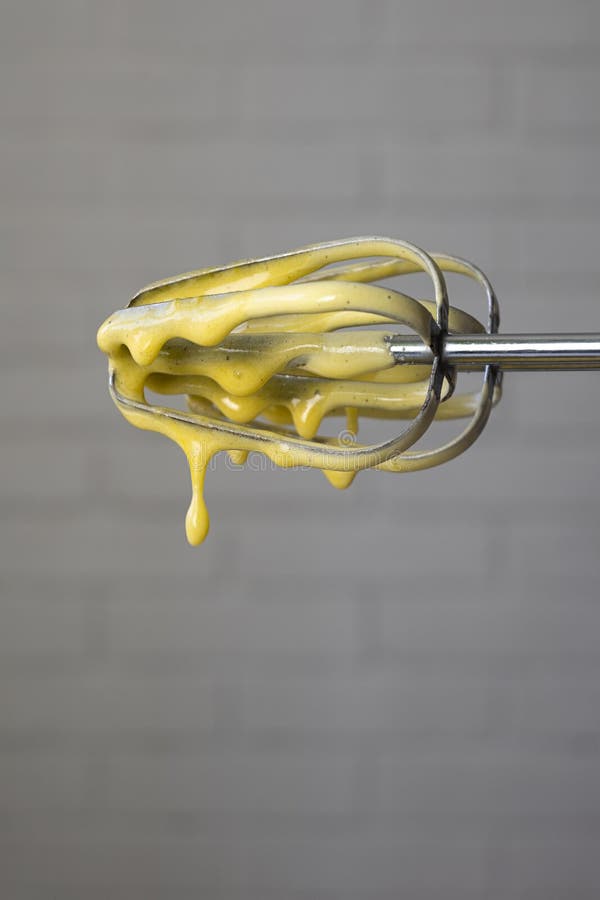 Raw Cake Dough Dripping Down from Mixer Beaters Stock Image - Image of ...