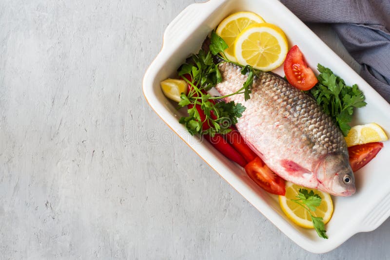 Raw Carp Fish with Spices and Vegetables for Cooking. the View from the ...