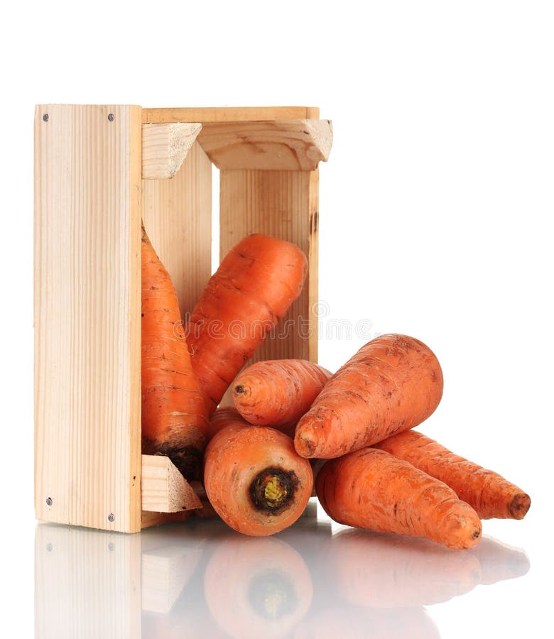 Raw carrots in wooden box stock photo. Image of food - 23154542
