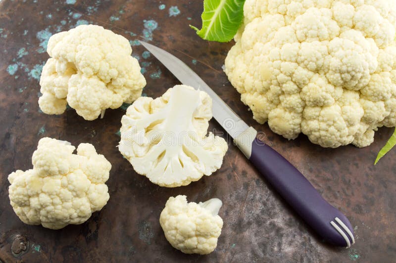 Raw Cauliflower on a Wooden Table Stock Image - Image of slices ...