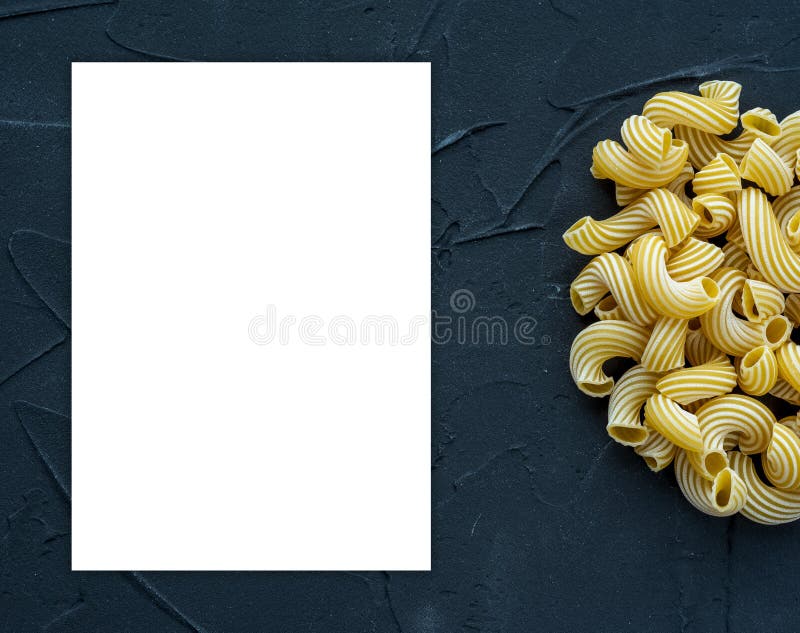 Macaroni Rigati Background with Pasta on a Black Background with a Side ...