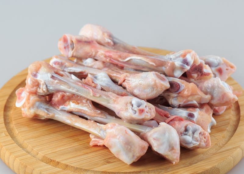 Raw Chicken Bones on a White Background Stock Photo - Image of isolated ...