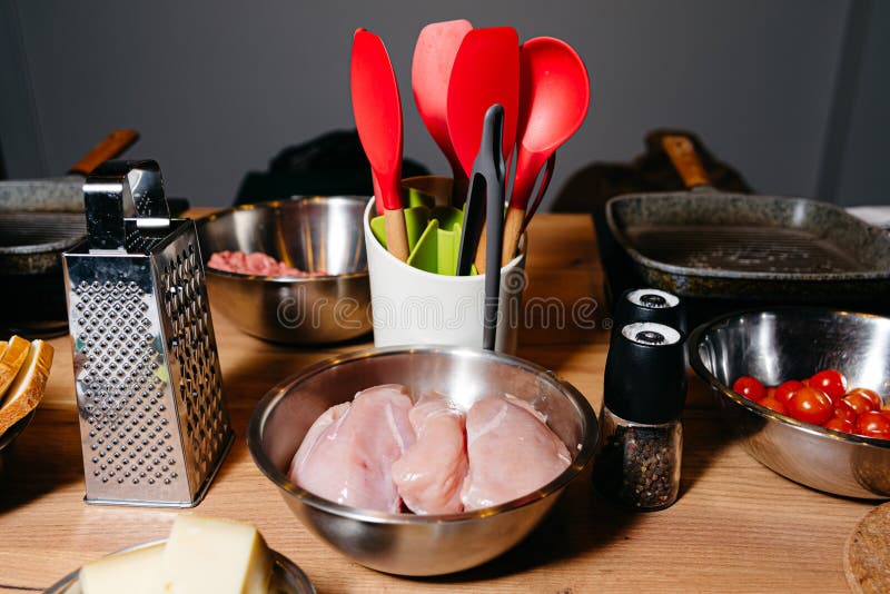 Raw Chicken Breast and Kitchen Utensils on Table Stock Image - Image of ...