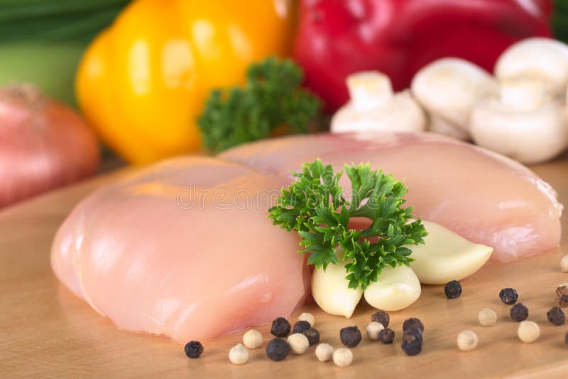 Raw Chicken Breast with Seasoning Stock Photo - Image of corn, pepper ...