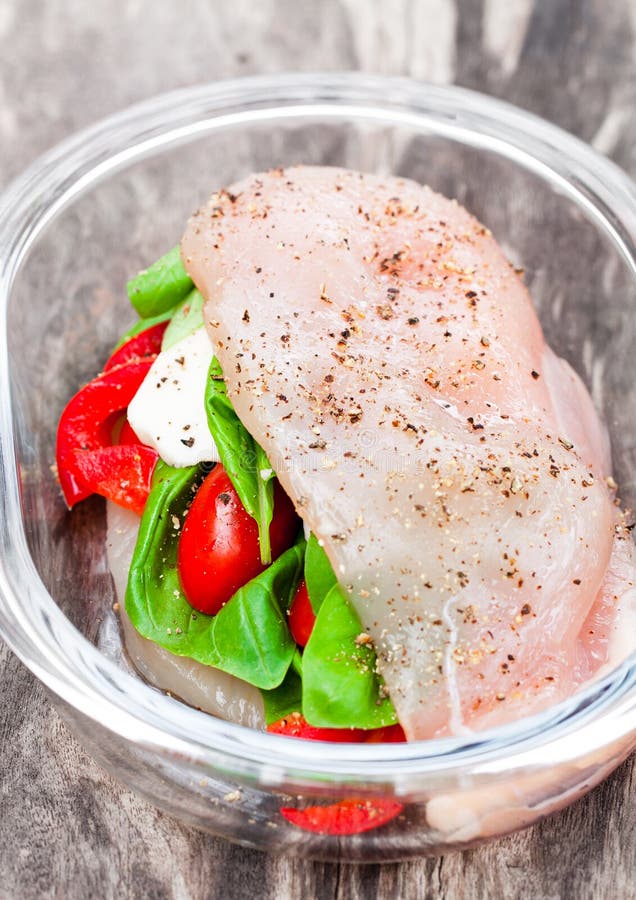 Raw Chicken Breast Stuffed with Mozzarella and Vegetables Stock Photo ...