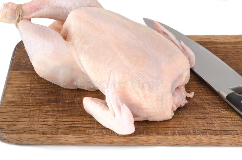 Raw Chicken Carcass on Cutting Board Isolated Stock Photo - Image of ...