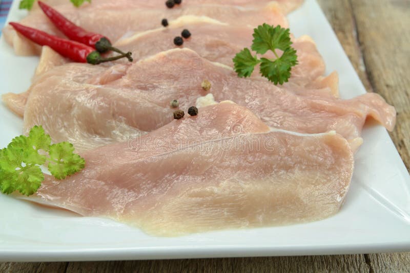 Raw chicken cutlets stock image. Image of poultry, herb - 163958047