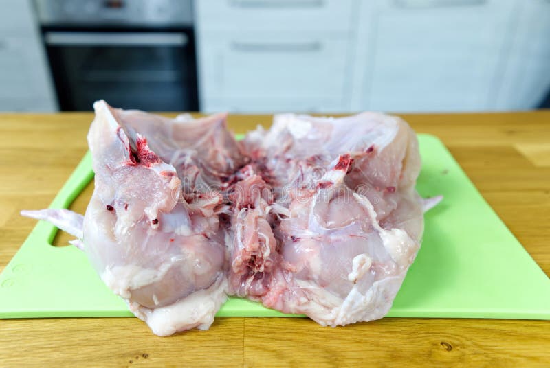 Raw Chicken Cutted in Half on a Cutting Board. Home Food Making Process ...