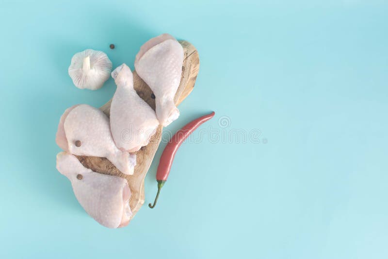 Raw Chicken Drumstick on a Wooden Stand Close-up Stock Image - Image of ...
