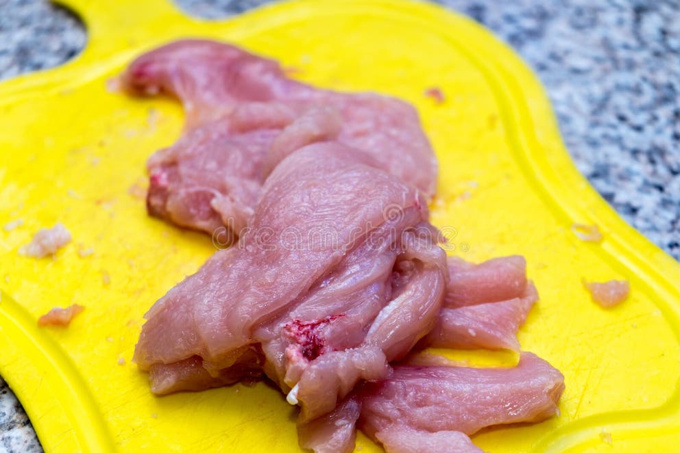 Raw chicken filet on board stock photo. Image of background - 85642234