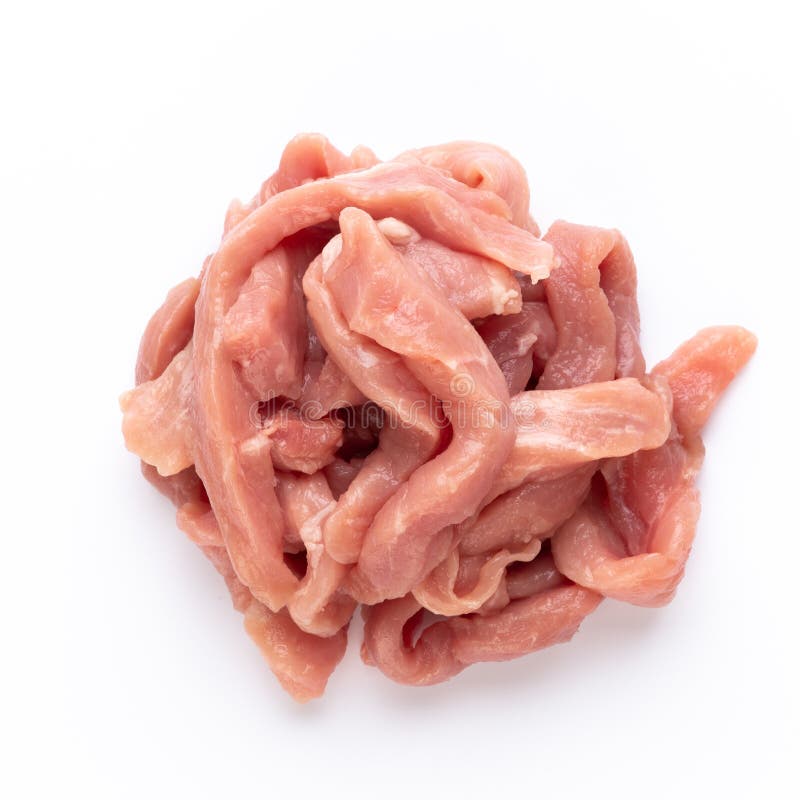 Raw Chicken Fillet. Small Pieces of Meat Isolated on White Stock Photo ...