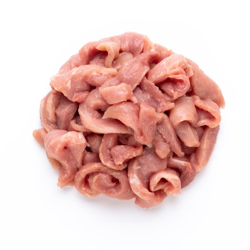 Raw Chicken Fillet. Small Pieces of Meat Isolated on White Stock Photo ...