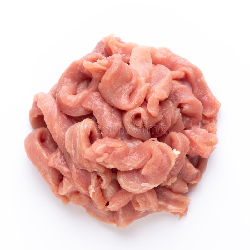 Raw Chicken Fillet. Small Pieces of Meat Isolated on White Stock Photo ...