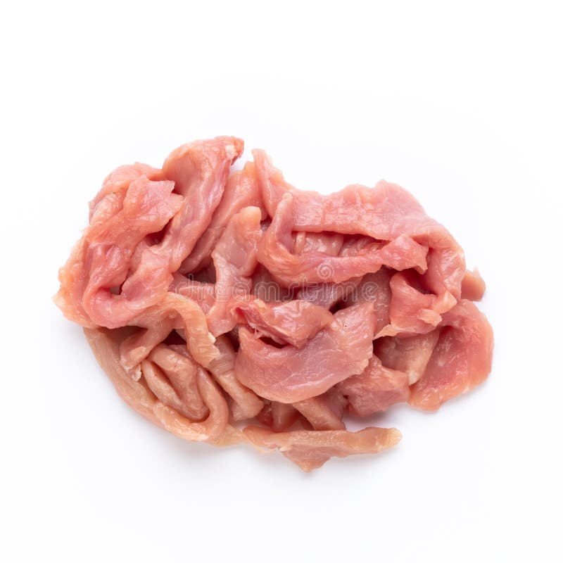 Raw Chicken Fillet. Small Pieces of Meat Isolated on White Stock Photo ...