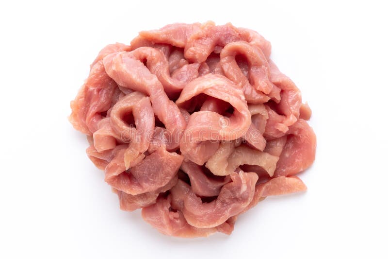 Raw Chicken Fillet. Small Pieces of Meat Isolated on White Stock Image ...