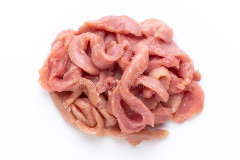 Raw Chicken Fillet. Small Pieces of Meat Isolated on White Stock Photo ...