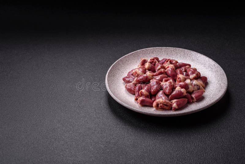 Raw Chicken Hearts with Salt, Spices and Herbs Stock Image - Image of ...