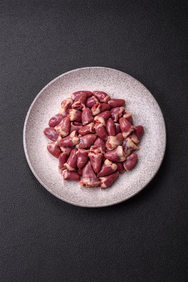Raw Chicken Hearts with Salt, Spices and Herbs Stock Image - Image of ...