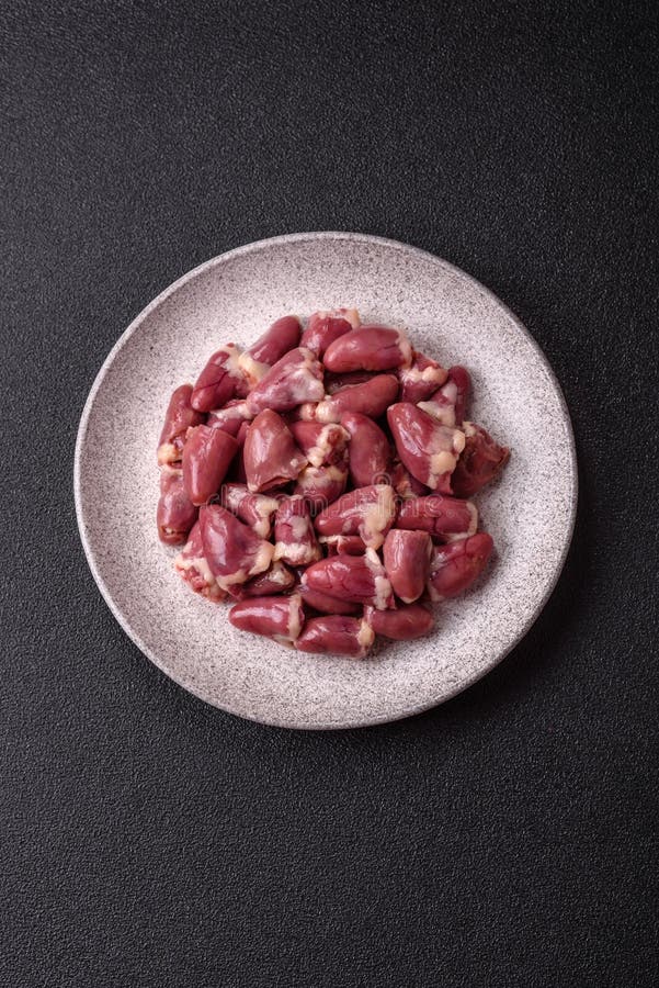 Raw Chicken Hearts with Salt, Spices and Herbs Stock Image - Image of ...