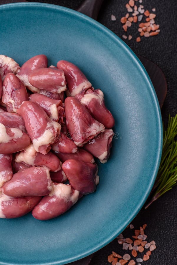 Raw Chicken Hearts with Salt, Spices and Herbs Stock Image - Image of ...