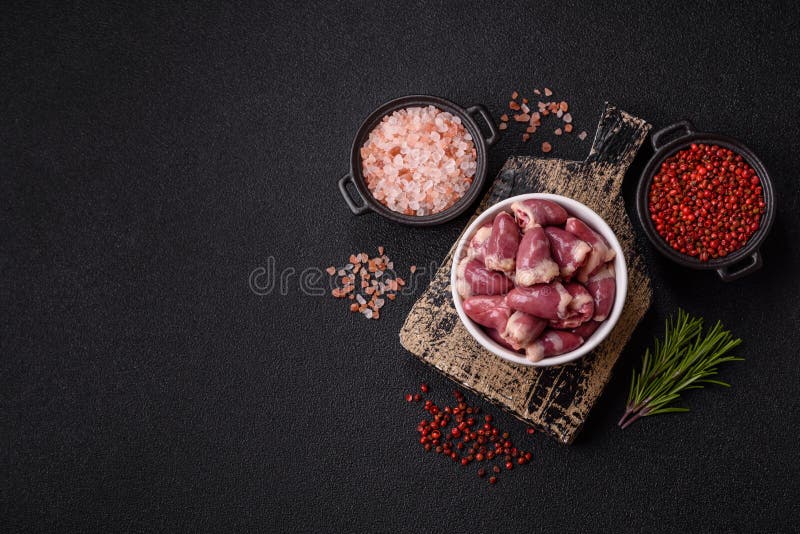 Raw Chicken Hearts with Salt, Spices and Herbs Stock Photo - Image of ...