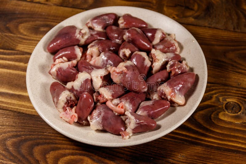 Raw Chicken Hearts on Wooden Table Stock Image - Image of bowl ...