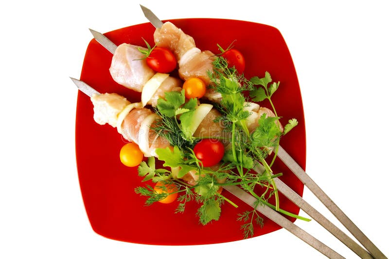 Raw chicken kebabs on red stock photo. Image of delicious - 35220240