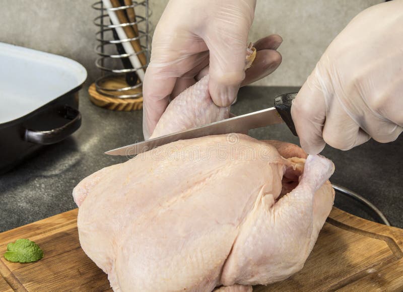 Raw Chicken on Kitchen Table Ready To Be Cut and Cook Stock Photo ...