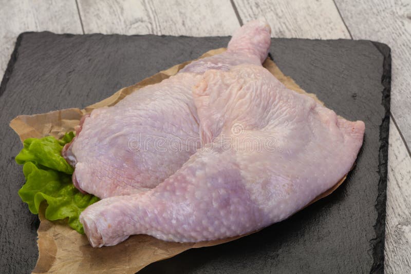 Raw chicken leg stock photo. Image of quarter, board - 187440682