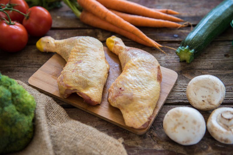 Raw Chicken Legs with Mixed Vegetable Stock Photo - Image of mixed ...
