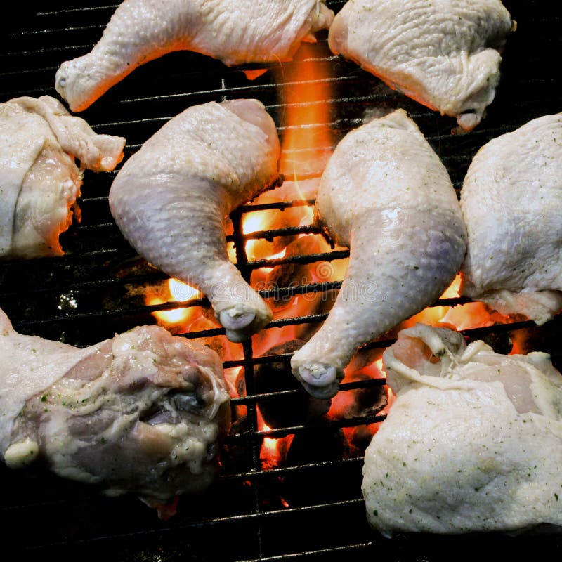 Raw Chicken Legs and Thighs on an Open Flame Stock Photo - Image of ...