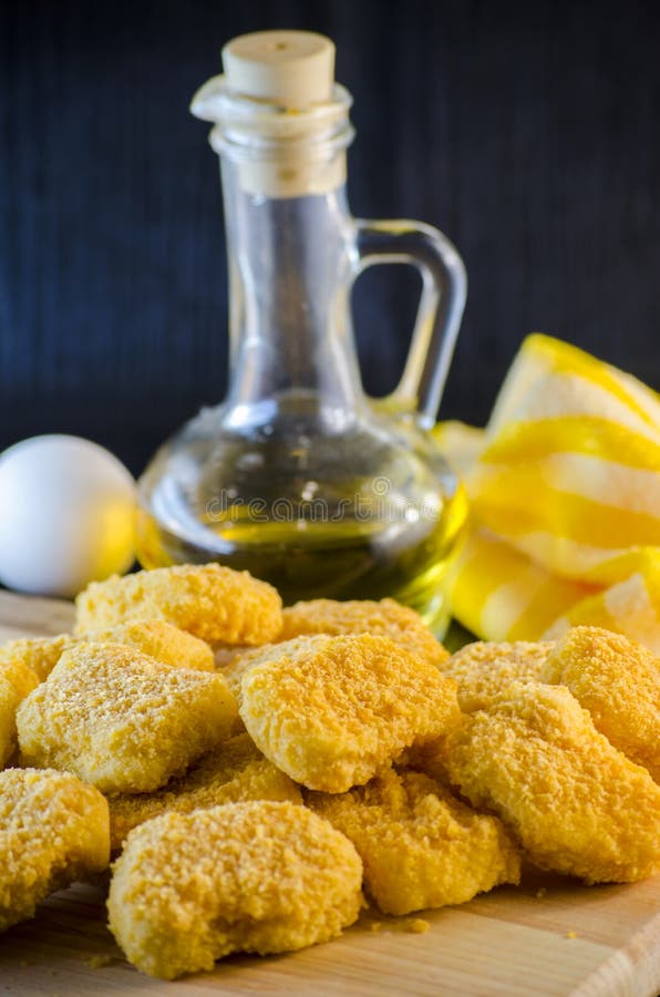 Raw chicken nuggets stock image. Image of junkfood, black - 89190097