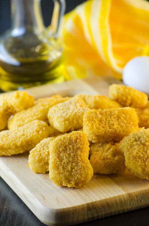 Raw chicken nuggets stock image. Image of board, nuggets - 89190173