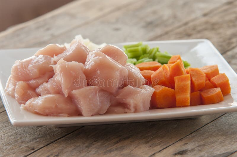 Raw Chicken Small Pieces Close Up on Wooden Background Stock Photo ...