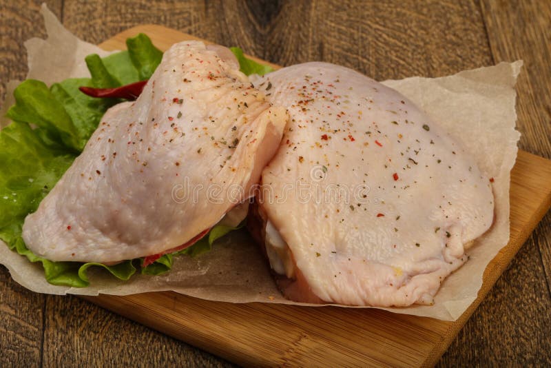 Raw chicken thigh stock image. Image of board, cooking - 112006135