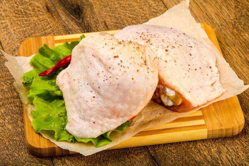 Raw chicken thigh stock photo. Image of studio, thigh - 150553426